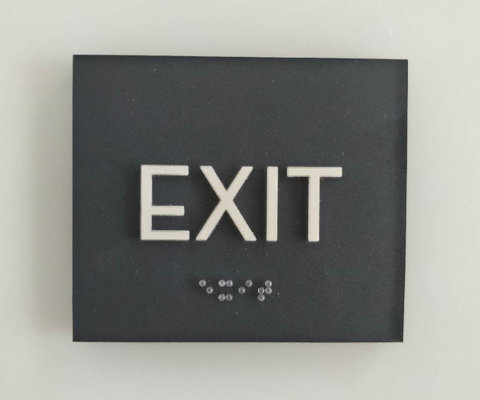 Deep Gray ADA Exit Sign 1 /32" Raised Text And Graphic Clear Grade II Braille