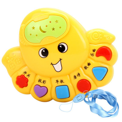 il bambino gioca il cassiere di storie con le macchine di apprendimento di storia del bambino della proiezione della luce del LED 2015