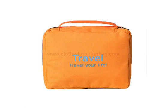 A two - way zipped main compartment travel storage folding  bag with handle