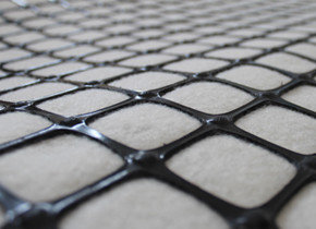High Tensile Anti - Tearing Fiberglass Geogrid Composite Geotextile , Width 1 - 5.8m