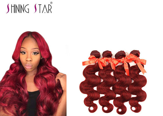El cabello humano 4 de la onda del cuerpo de 100 Peruvian lía color rojo de las extensiones #99J