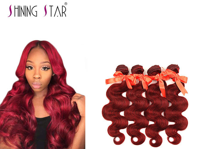 El cabello humano 4 de la onda del cuerpo de 100 Peruvian lía color rojo de las extensiones #99J