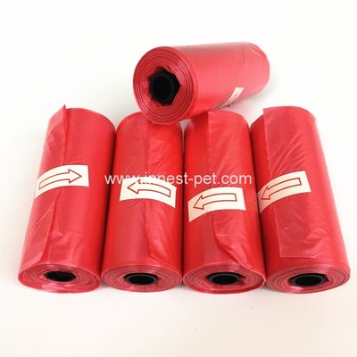 Red color plain PE bags dog poop waste bag on roll and plastic bone shape dispenser