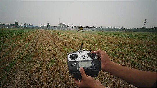 current uses of drones fumigation spraying drone sprayer agriculture uav crop duster
