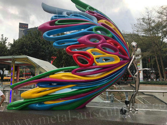 Human Body With Wings Metal Art Sculpture Painted Color As City Landmark