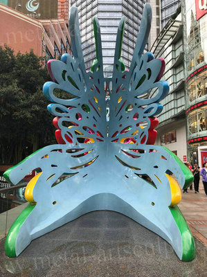 Human Body With Wings Metal Art Sculpture Painted Color As City Landmark