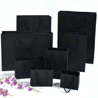 Custom printing single color black paperboard bag clothes shopping bag supplier