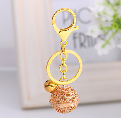 hollow out small bell keychain