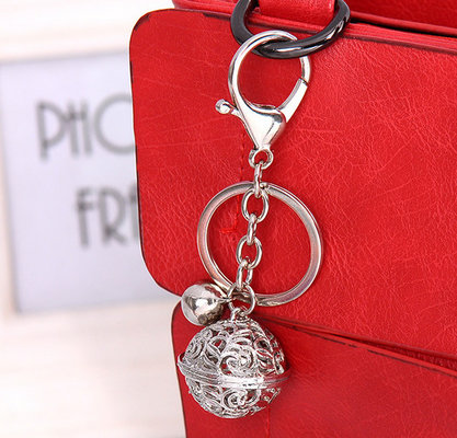 hollow out small bell keychain