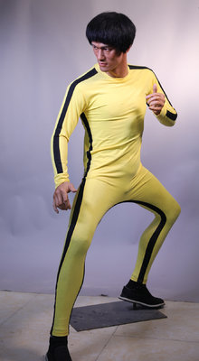 Figura di cera di Bruce Lee della stella di kung-fu mestieri a grandezza naturale di abitudine di nome dell'elemento della scultura della resina