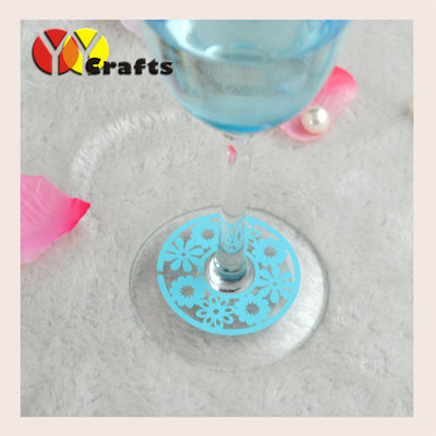 Blue wine glass tag flower paper wine claim on wine glass bottom